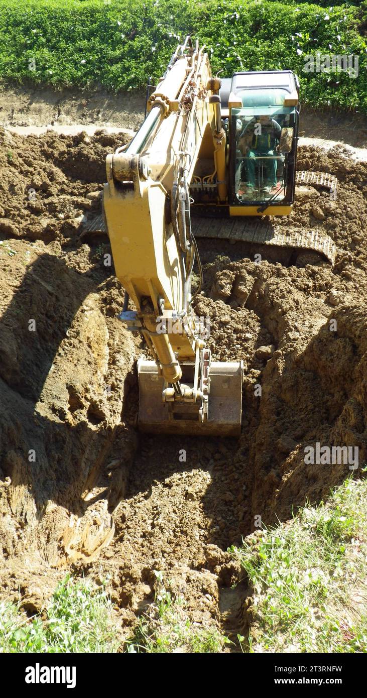 Excavator at a construction site, heavy machinery for earthworks and ...