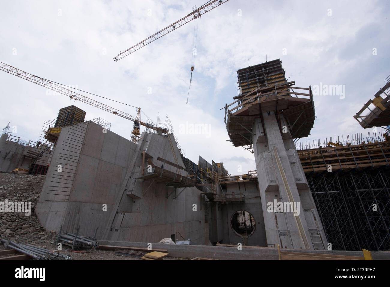 Construction crane in building industry, heavy machine at construction ...