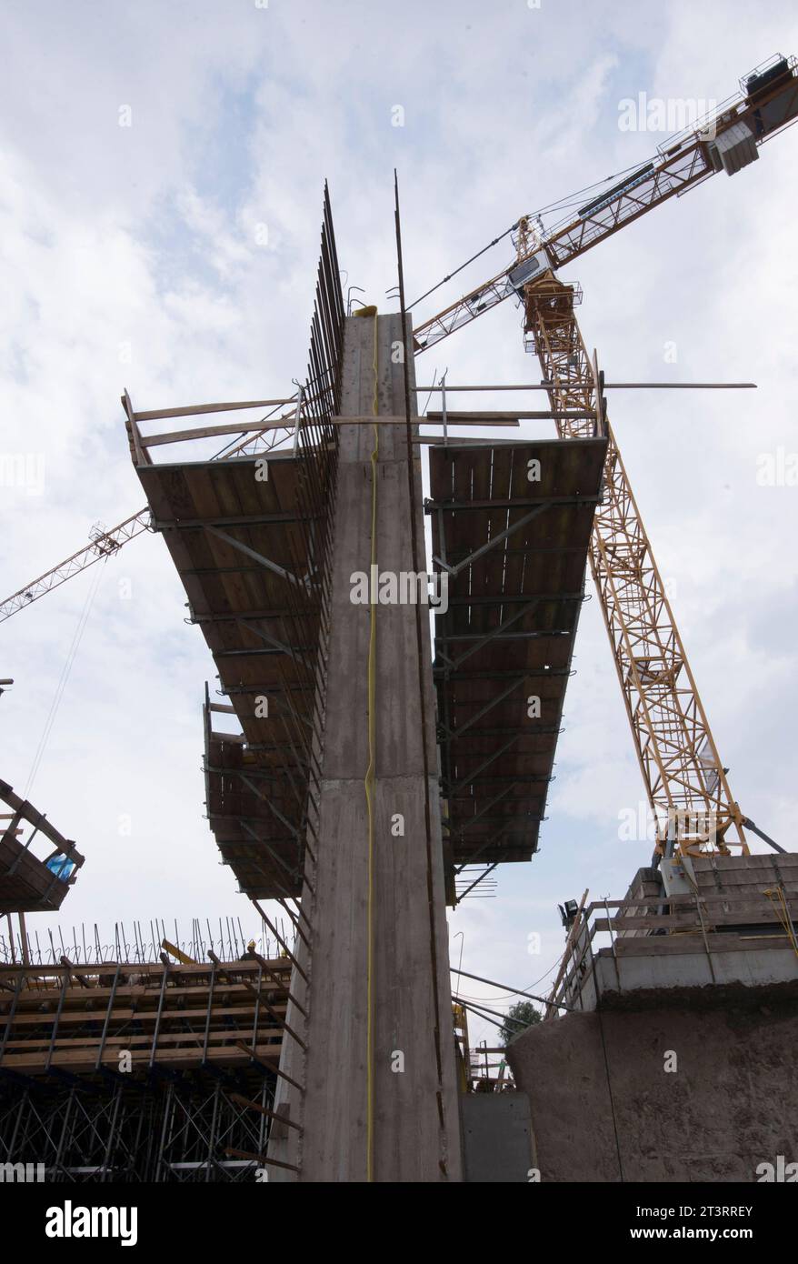 Construction crane in building industry, heavy machine at construction ...