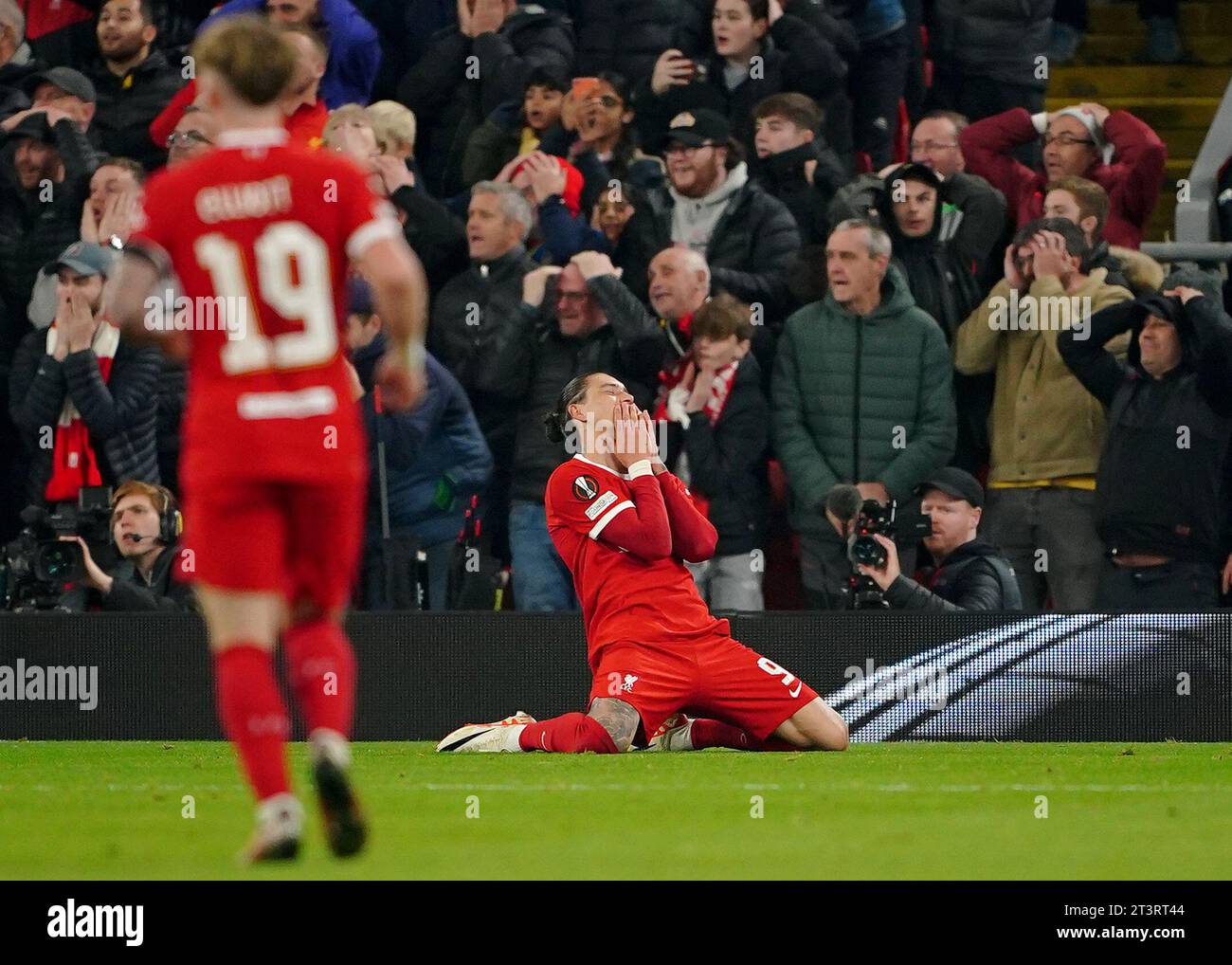 Liverpool's Darwin Nunez reacts after missing before team-mate Ryan ...