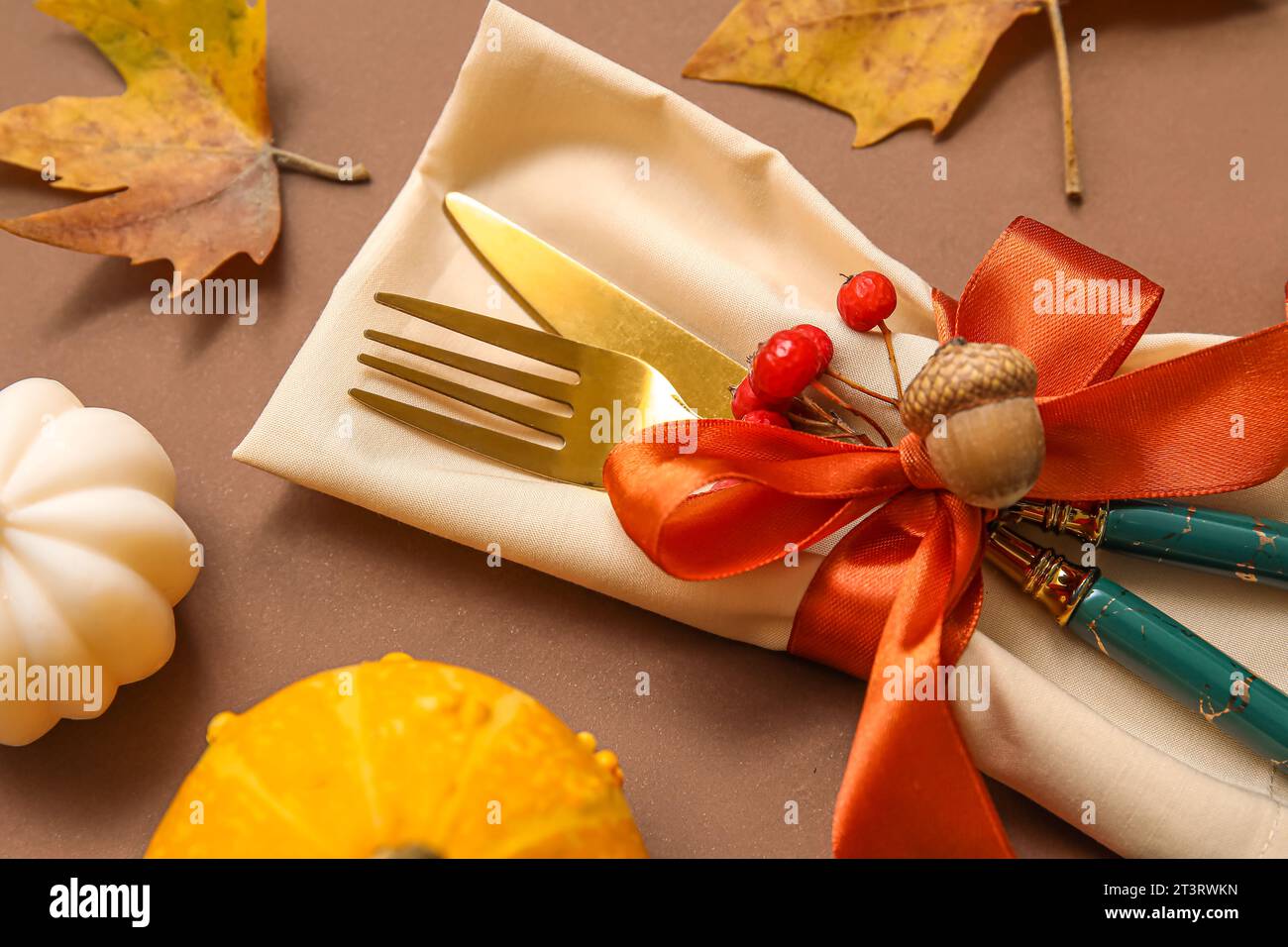 Autumn table setting on brown background Stock Photo - Alamy