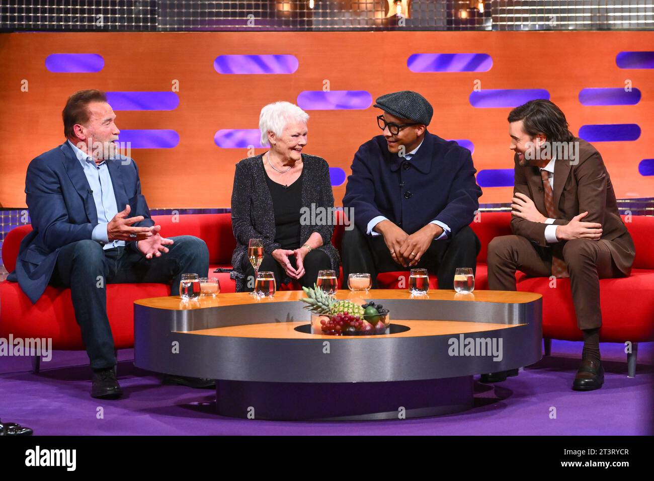 EDITORIAL USE ONLY (left to right) Arnold Schwarzenegger, Dame Judi ...