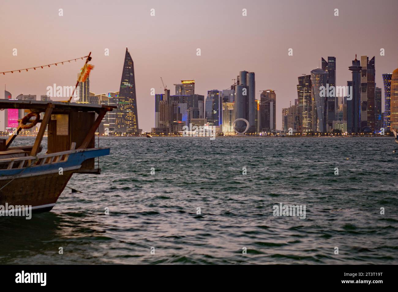 A view from the Dhow harbour in Doha, Qatar towards the west bay area ...