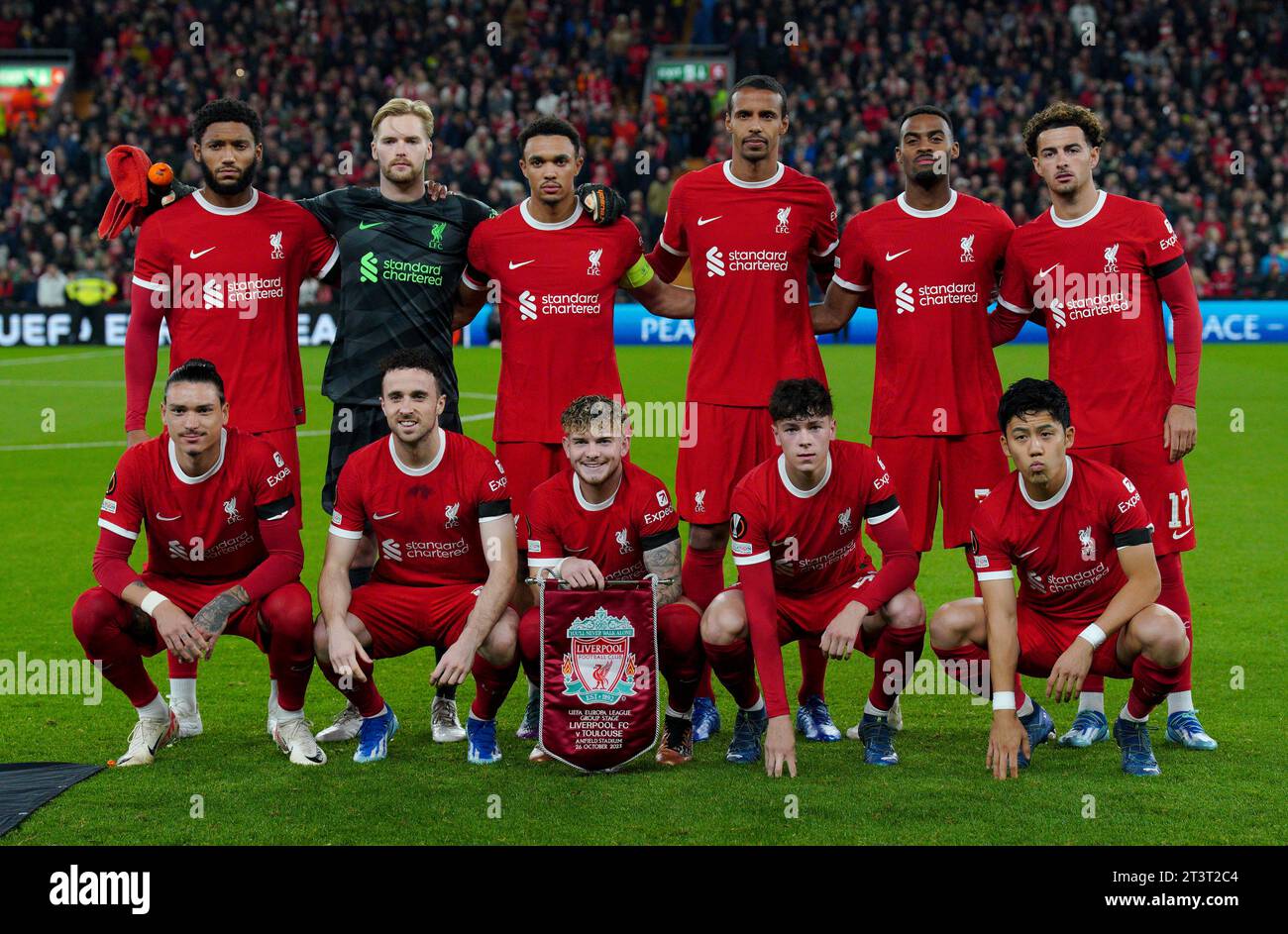 Liverpool players line up, back row, left to right, Joe Gomez, Caoimhin ...