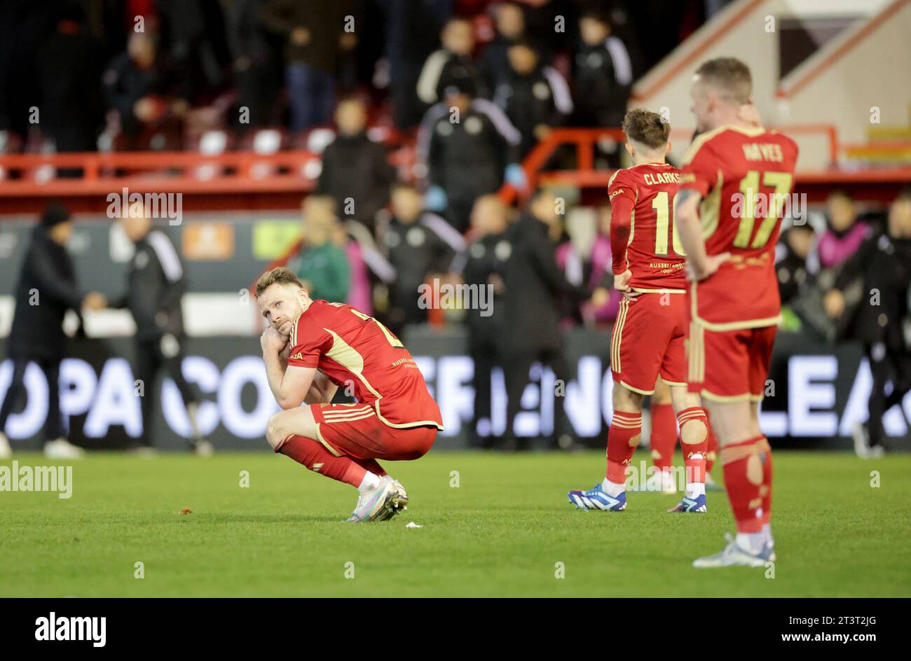 Aberdeen's Nicky Devlin (left) reacts following defeat during the UEFA ...