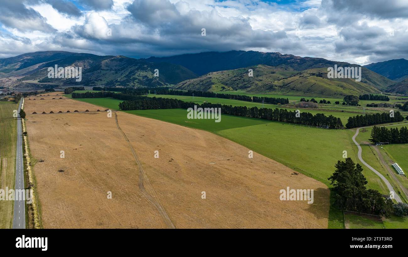Agricultural farmland in a rural valley Stock Photo - Alamy