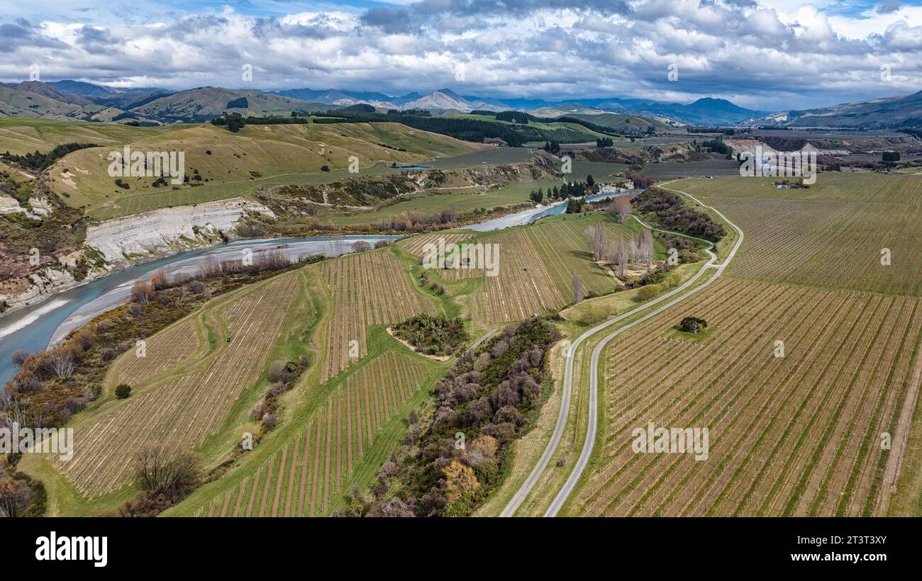 The blue water of the Awatere river flowing through agricultural ...