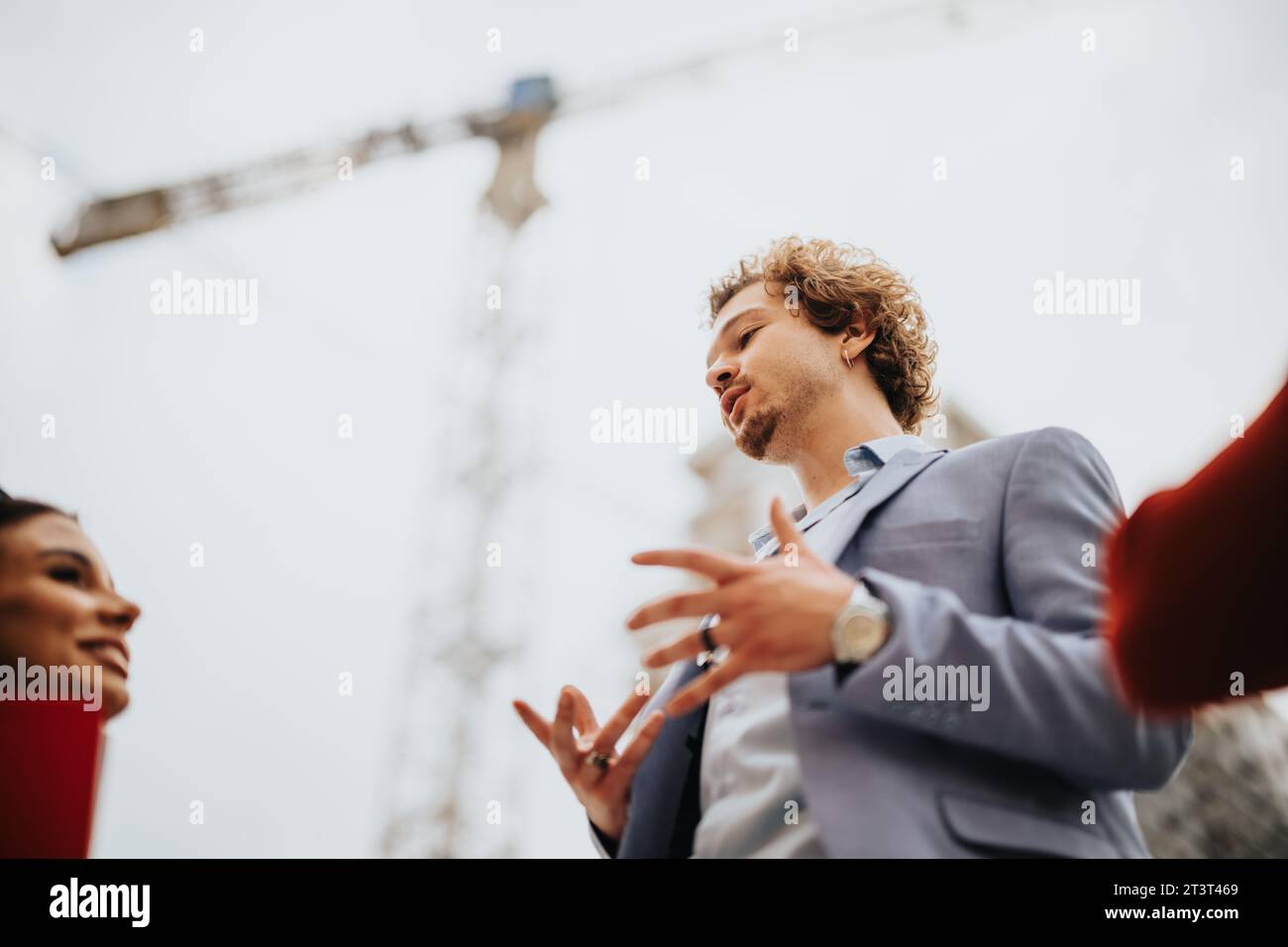 Architects and engineers discuss project details, walk through the ...