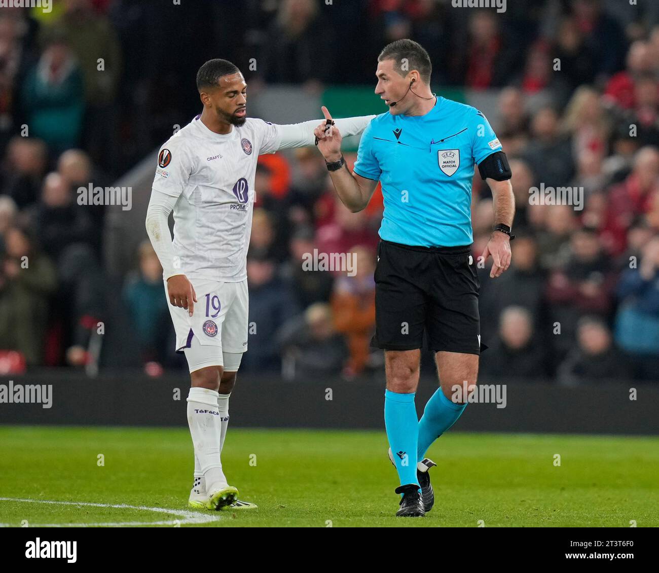 Frank Magri #19 of Toulouse speaks with referee Rade Obrenovi during ...