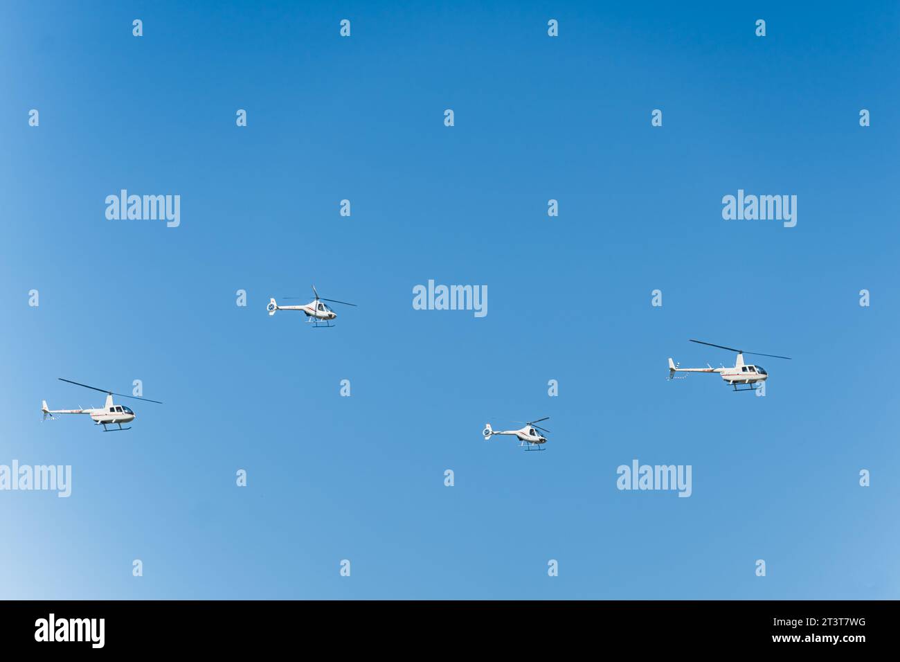 Group combat helicopters, aerobatic team performs flight at air show ...