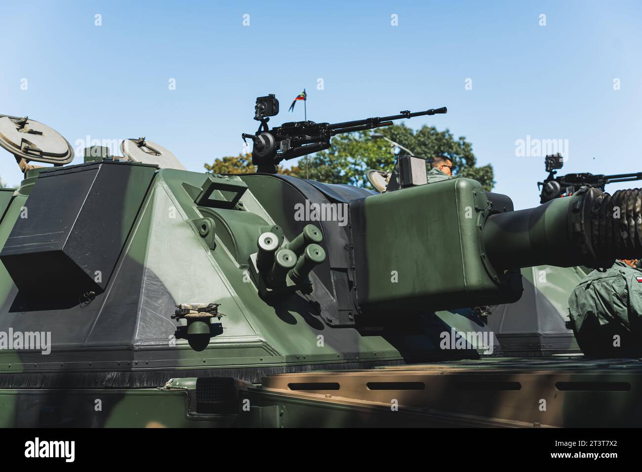Machine gun on the top of military battle tank. Outdoor view. Modern ...