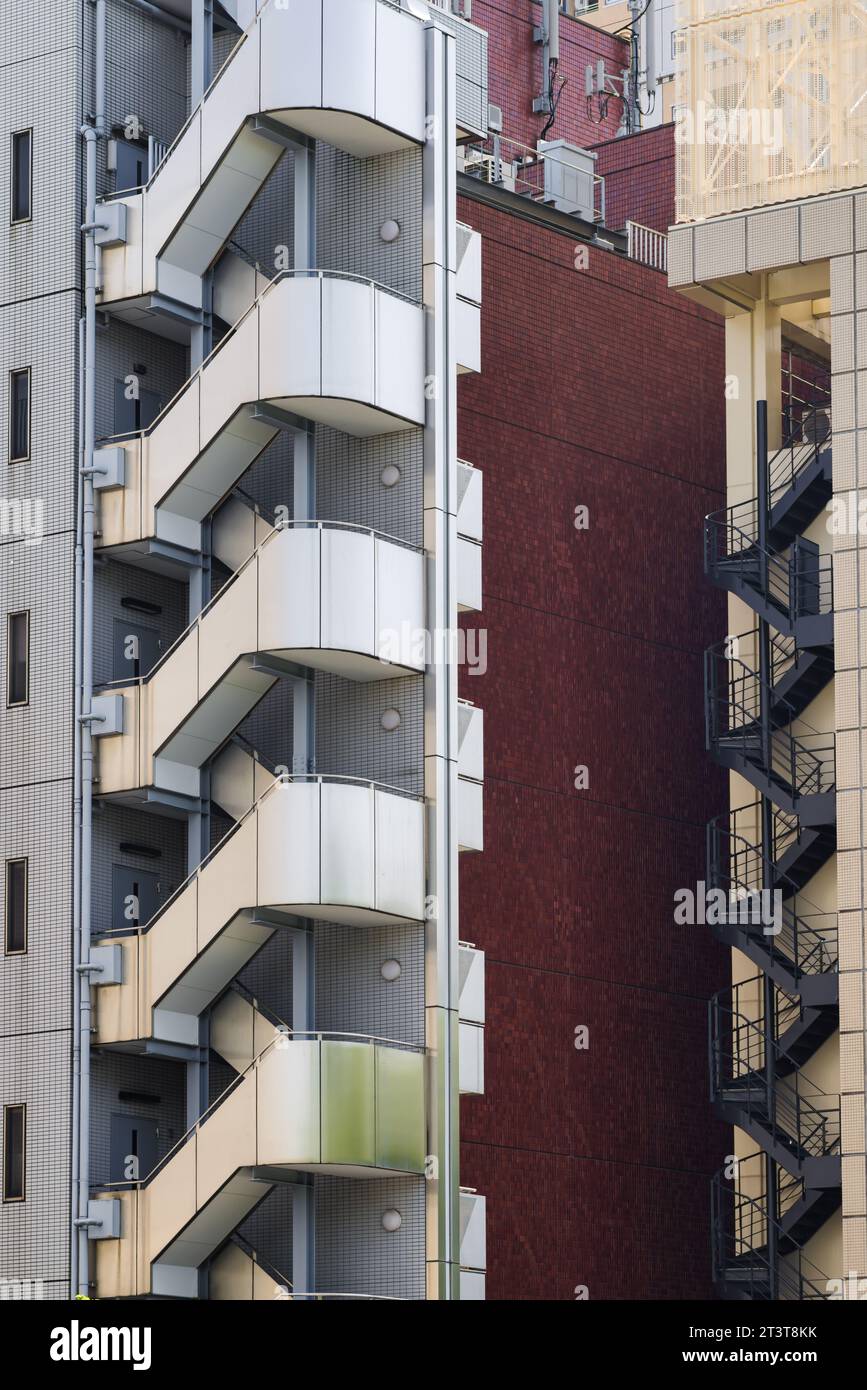 picture of a high-rise residential building with external stairs in ...