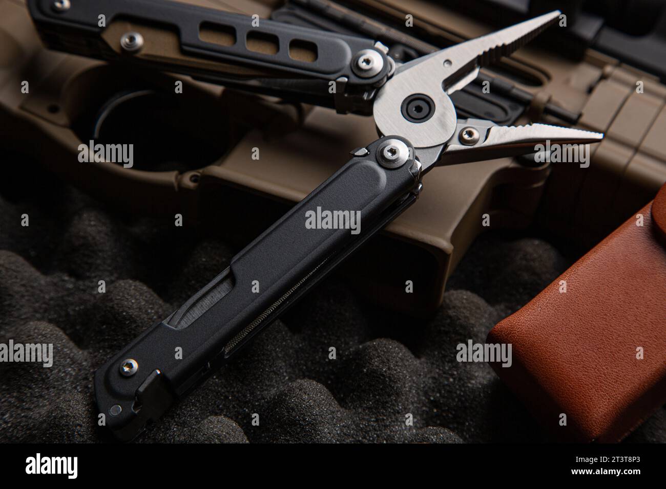 Modern universal army multitool. A tool for all occasions. Gray foam ...
