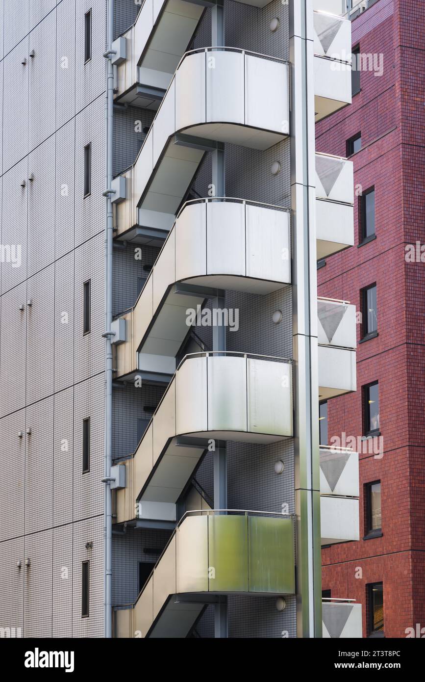 picture of a high-rise residential building with external stairs in ...