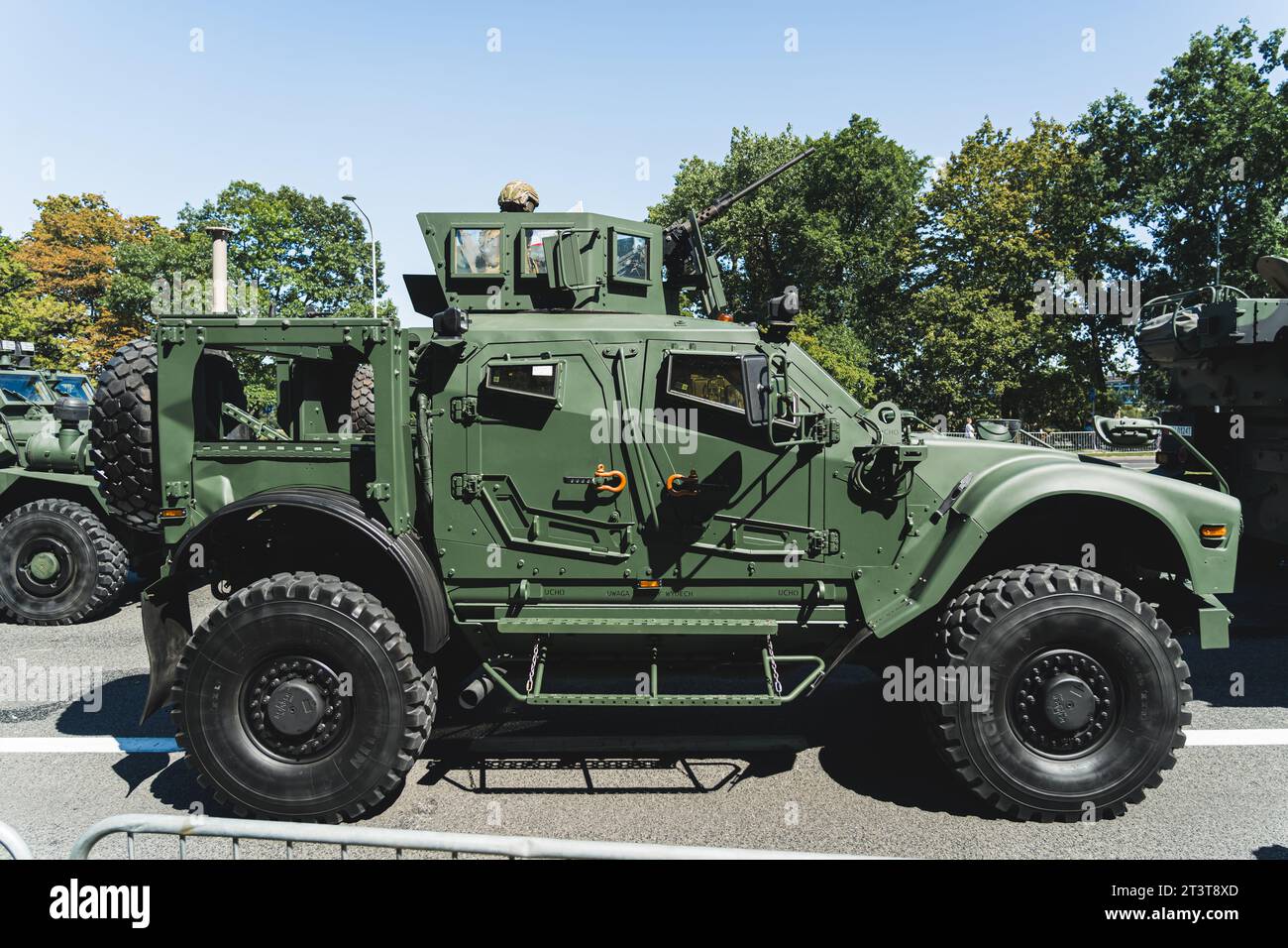 Outdoor side view of dark green light utility vehicle used by the army ...