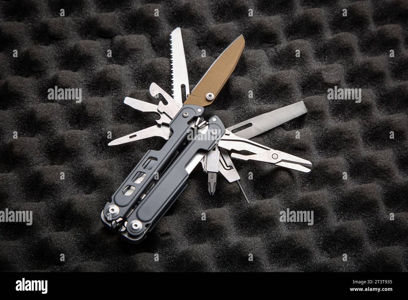 Modern universal army multitool. A tool for all occasions. Gray foam ...