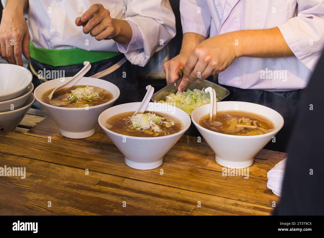 picture of Japanese chefs preparing traditional soups at a street kitchen in Tokyo, Japan Stock ...