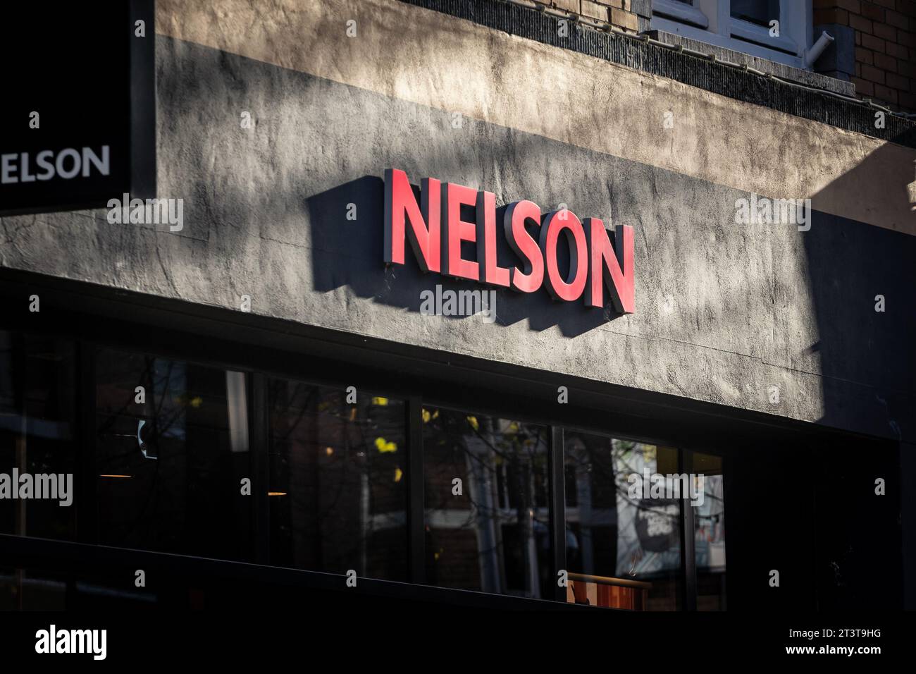 Picture of a sign with the logo of nelson shoes on their main store for ...