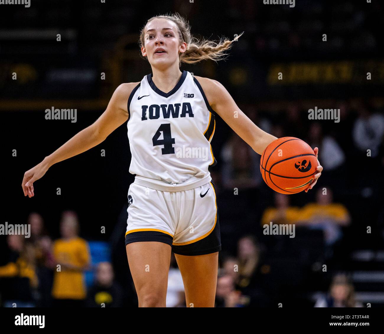 Iowa Hawkeyes guard Kylie Feuerbach (4) dribbles during an exhibition ...