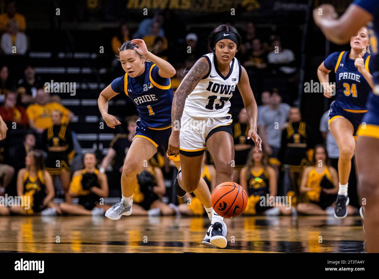 Iowa Hawkeyes guard Kennise Johnson (13) dribbles during an exhibition ...
