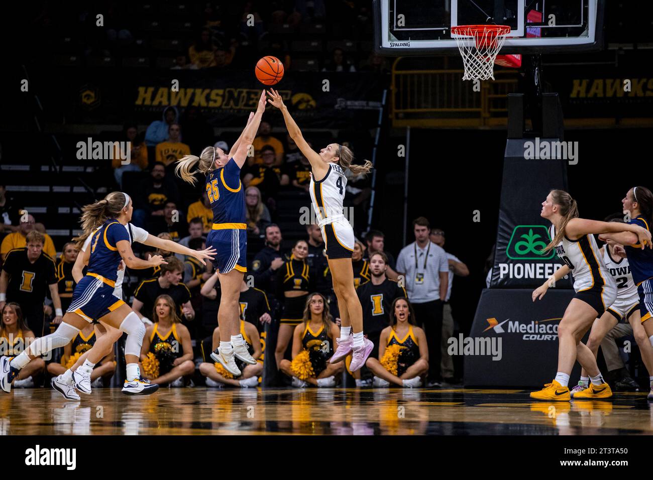 Iowa Hawkeyes guard Kylie Feuerbach (4) defends a shot by Clarke Pride ...