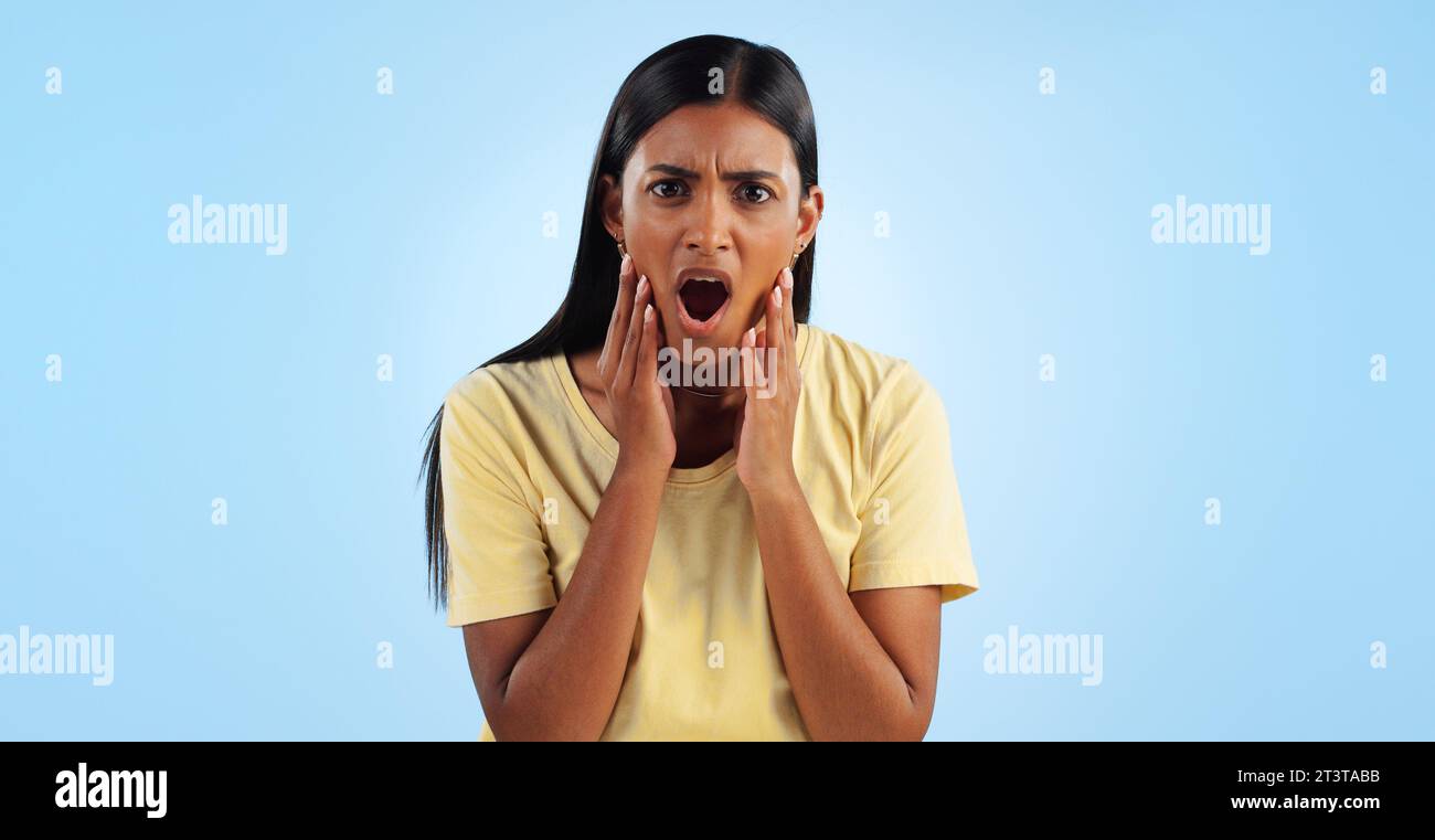 Shock, surprise and woman in portrait in studio with reaction, facial ...