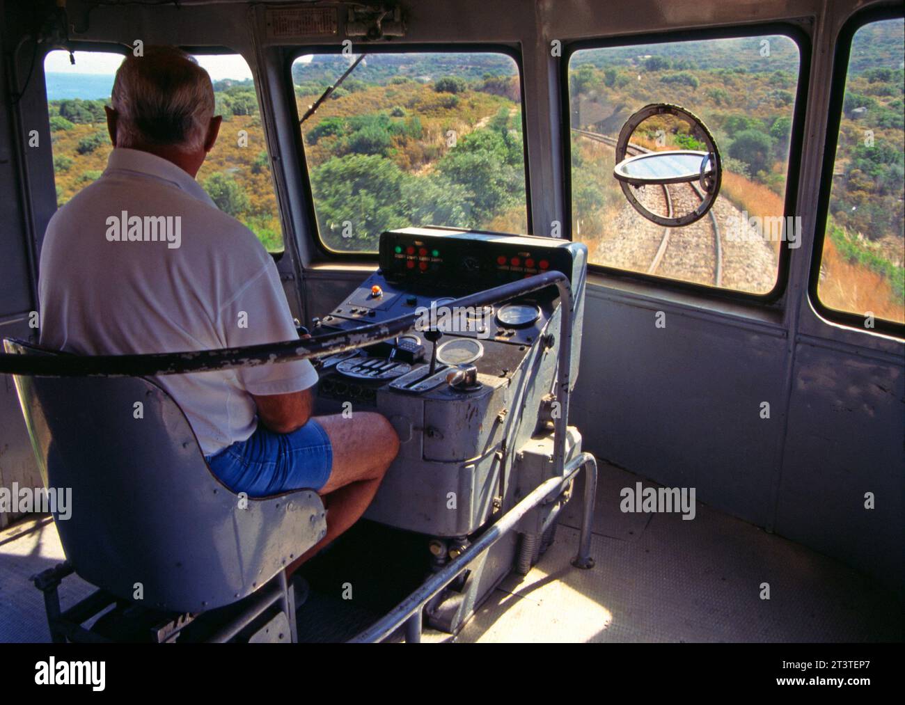 Train driver at the controls of La Micheline, the diesel train that ...