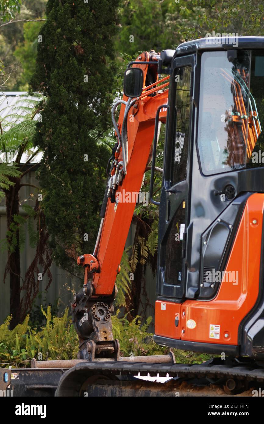 Orange and black backhoe tractor equipment for digging earth Stock ...