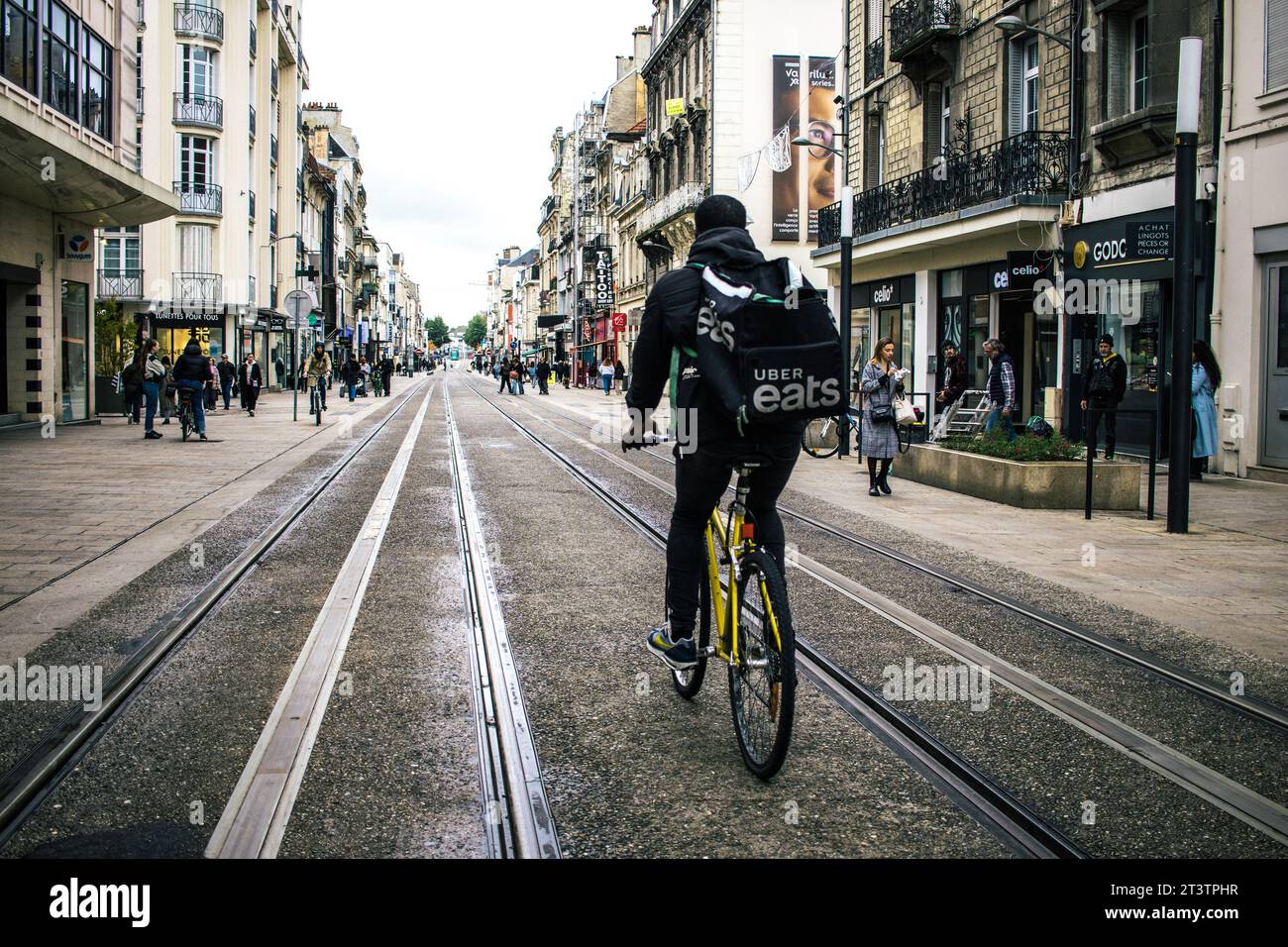 Reims, France - October 26, 2023 People rolling with a bicycle in the ...