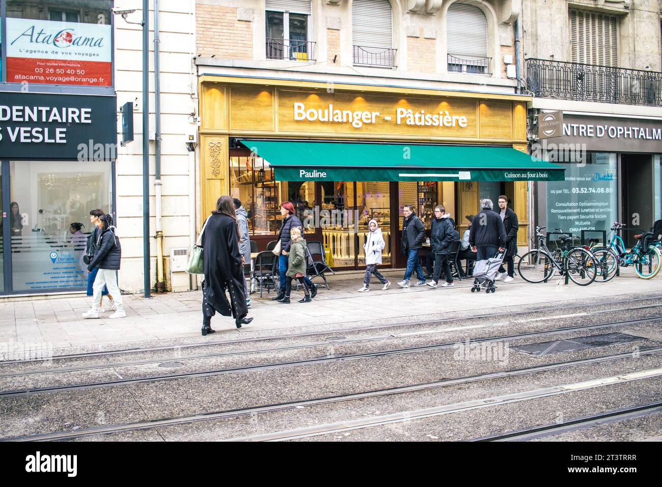 Reims, France - October 26, 2023 People wandering in the street of ...