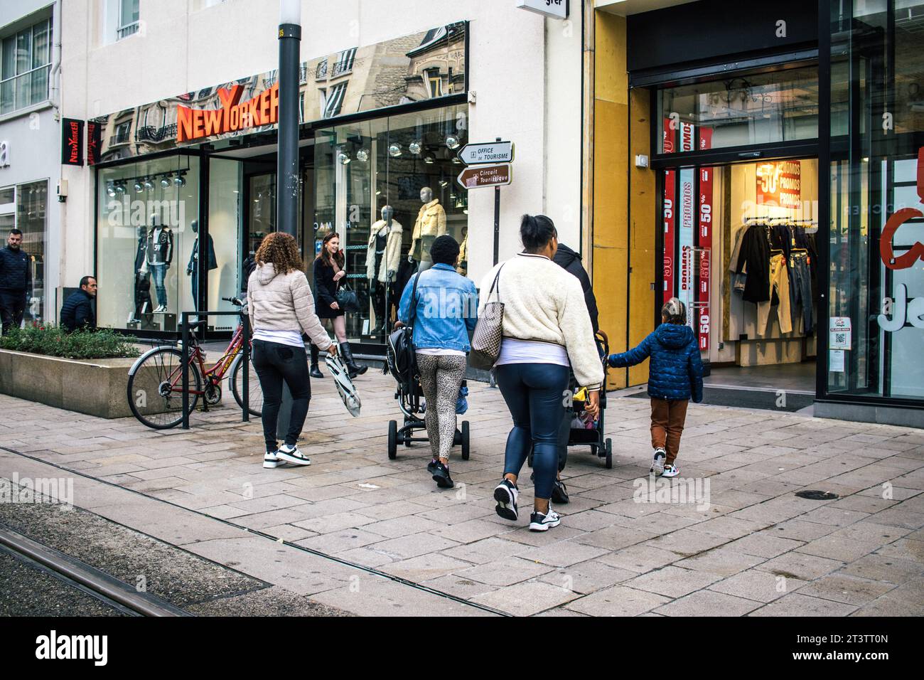 Reims, France - October 26, 2023 People wandering in the street of ...