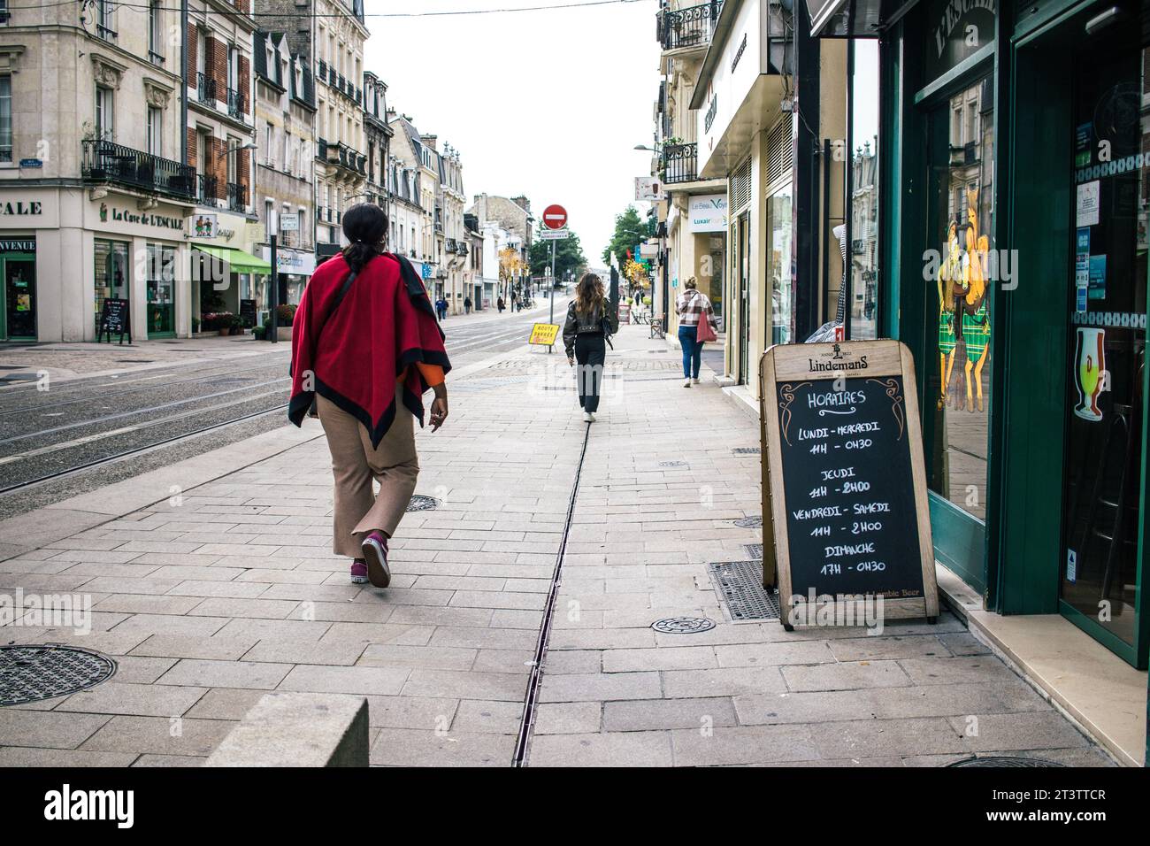 Reims, France - October 26, 2023 People wandering in the street of ...
