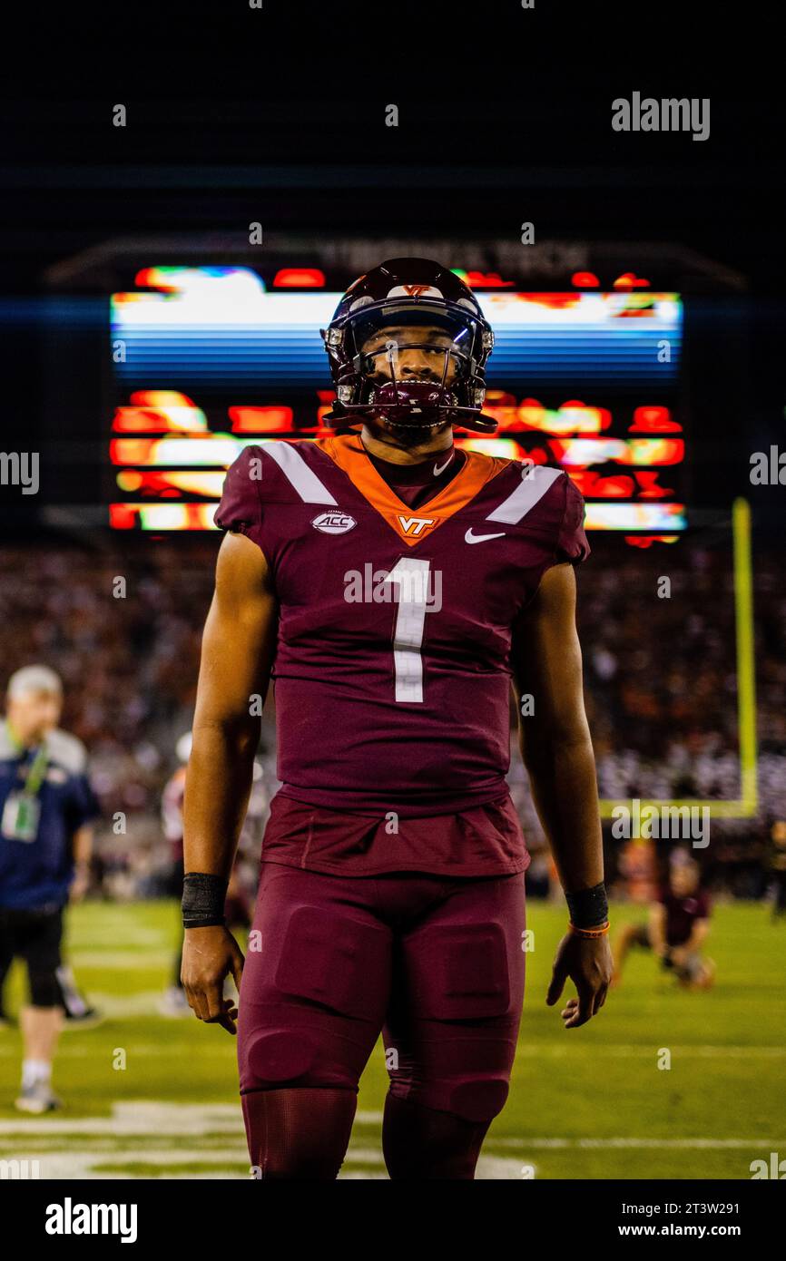 Blacksburg, VA, USA. 26th Oct, 2023. Virginia Tech Hokies quarterback Kyron Drones (1) gets ...