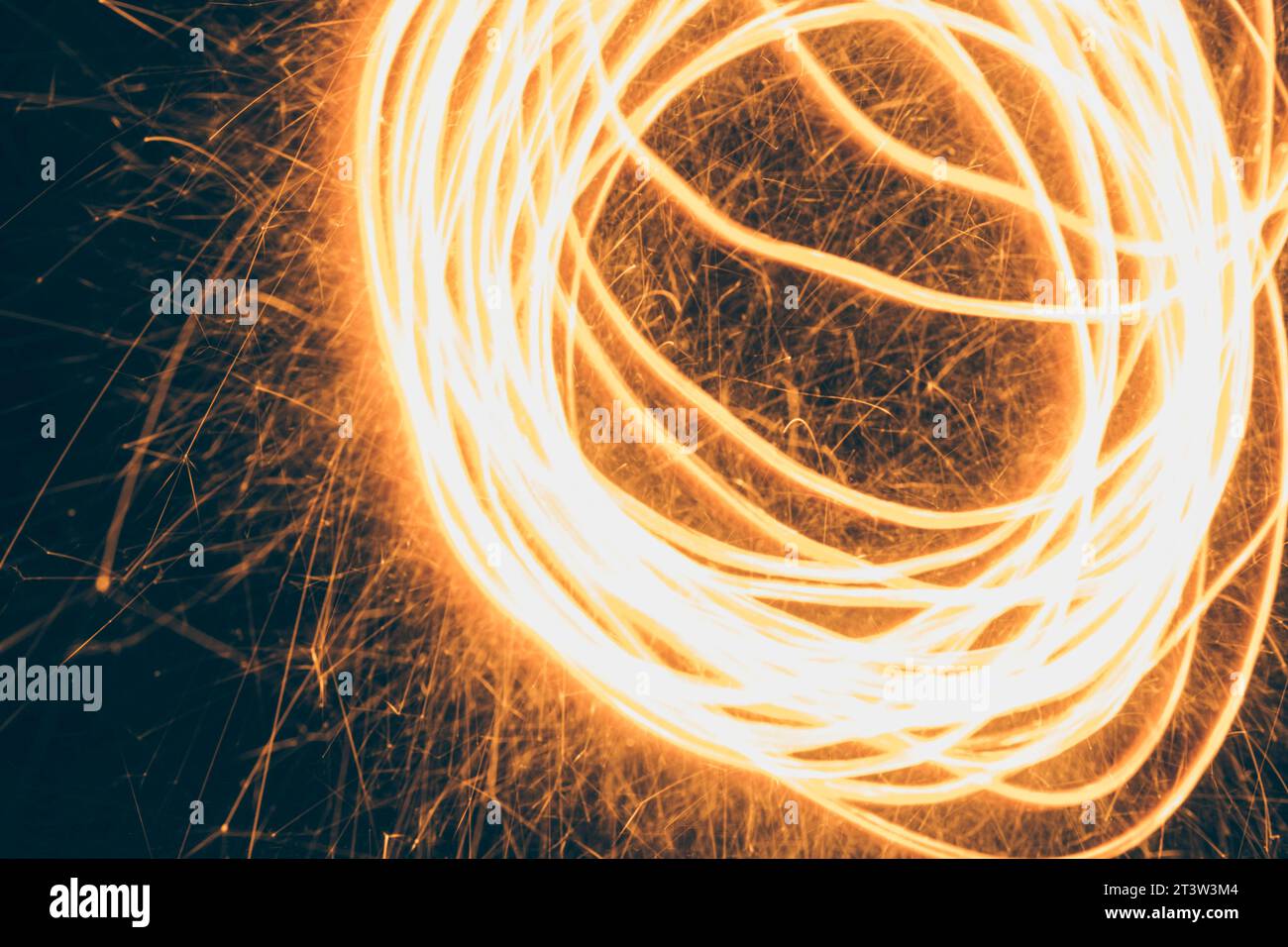 Swirling fire effect black background Stock Photo - Alamy