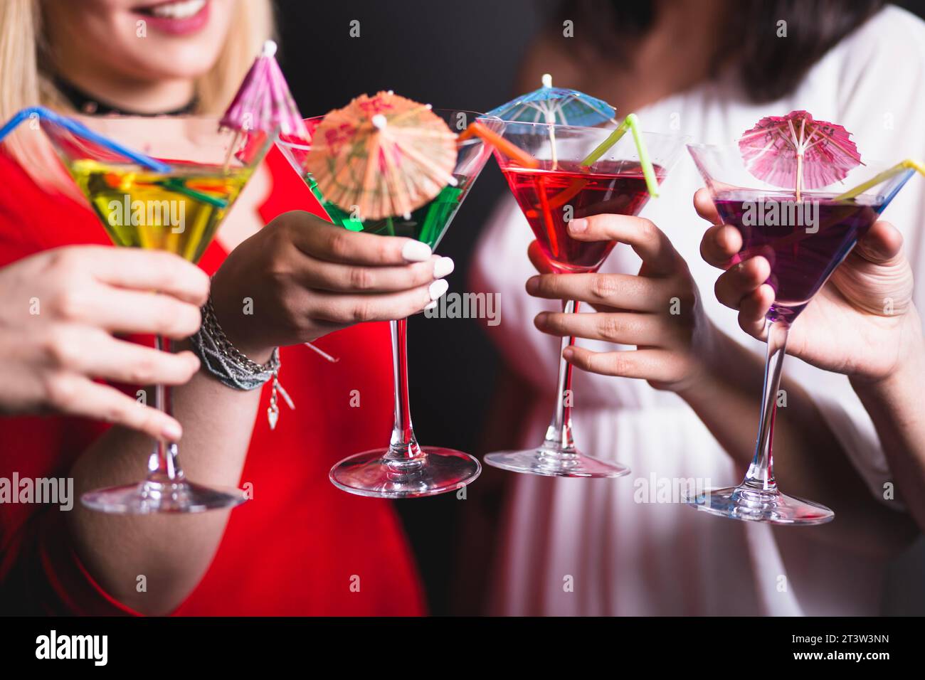 Toasting with cocktails party Stock Photo - Alamy