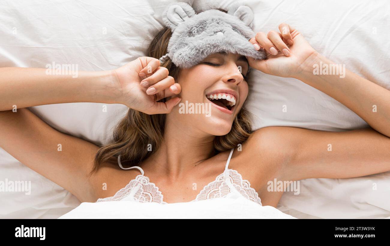 Top view woman getting ready go sleep Stock Photo - Alamy