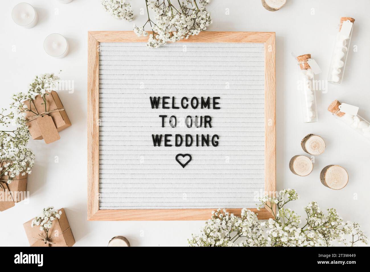 Welcome message decoration weddings white background Stock Photo - Alamy