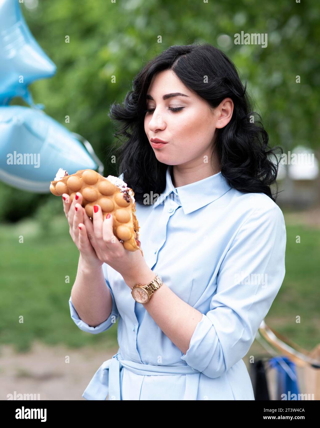 Female adult woman eating cookie hi-res stock photography and images ...