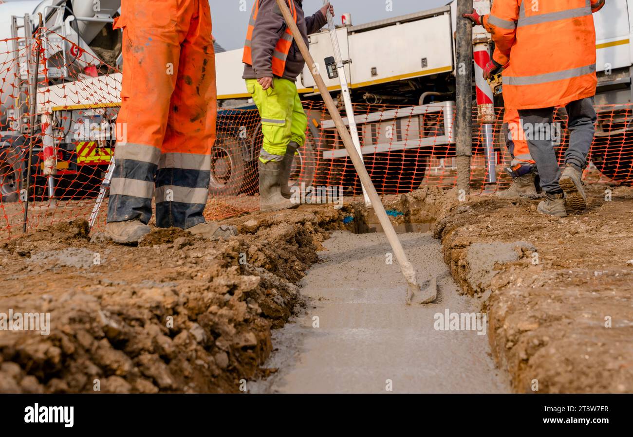Mobile concrete pump on construction site used bybuilders pouring house ...