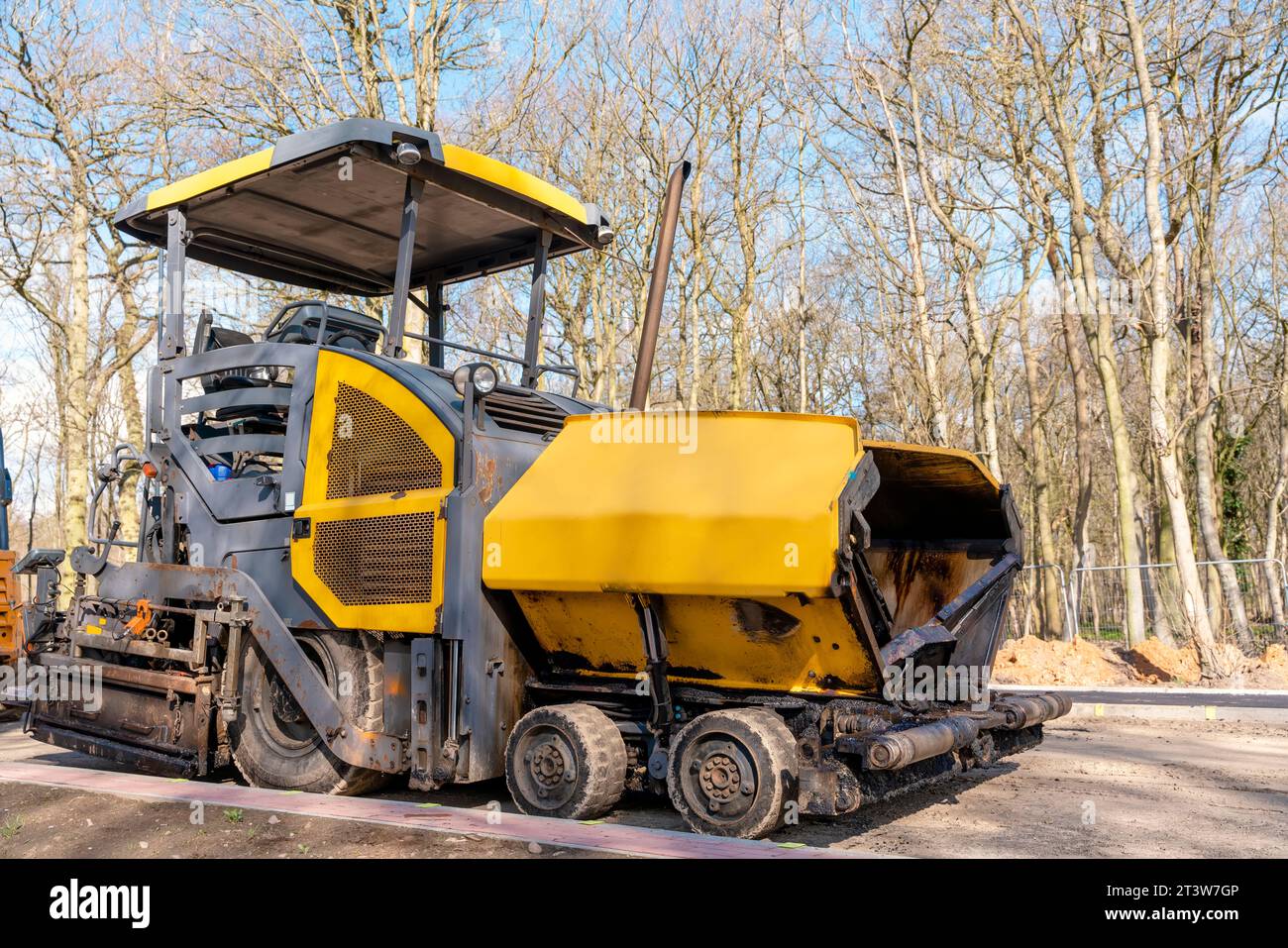 Asphalt paver on construction site ready for work Stock Photo - Alamy