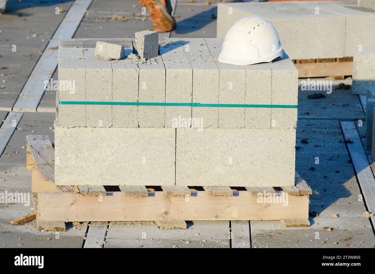 Concrete blocks delivered to construction site and placed next to the ...