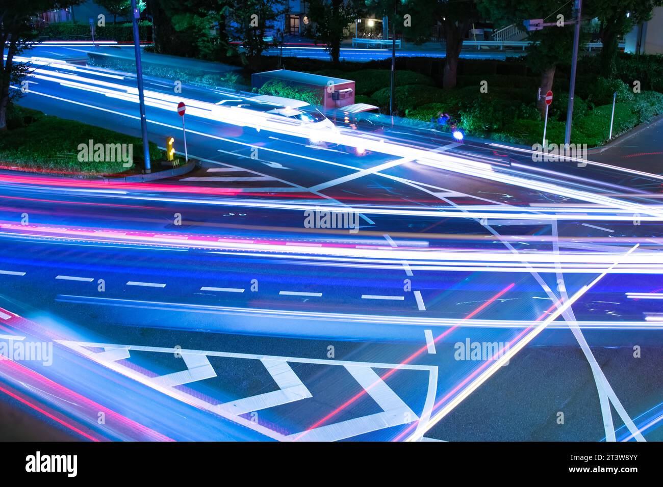 A night timelapse of traffic jam at the city intersection in Tokyo ...