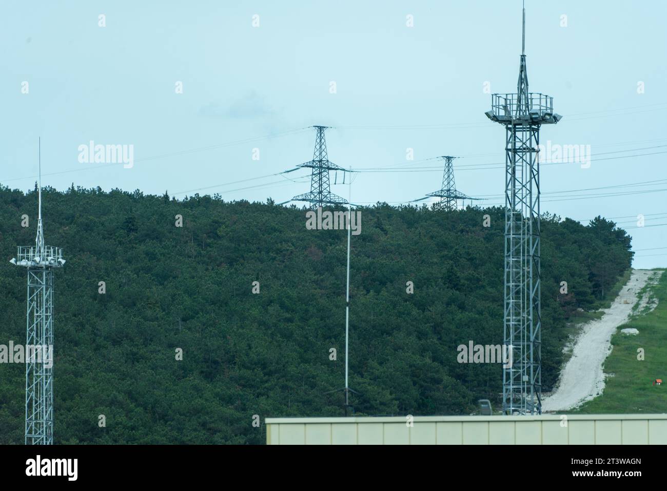 High voltage towers with sky background. Power line support with wires ...