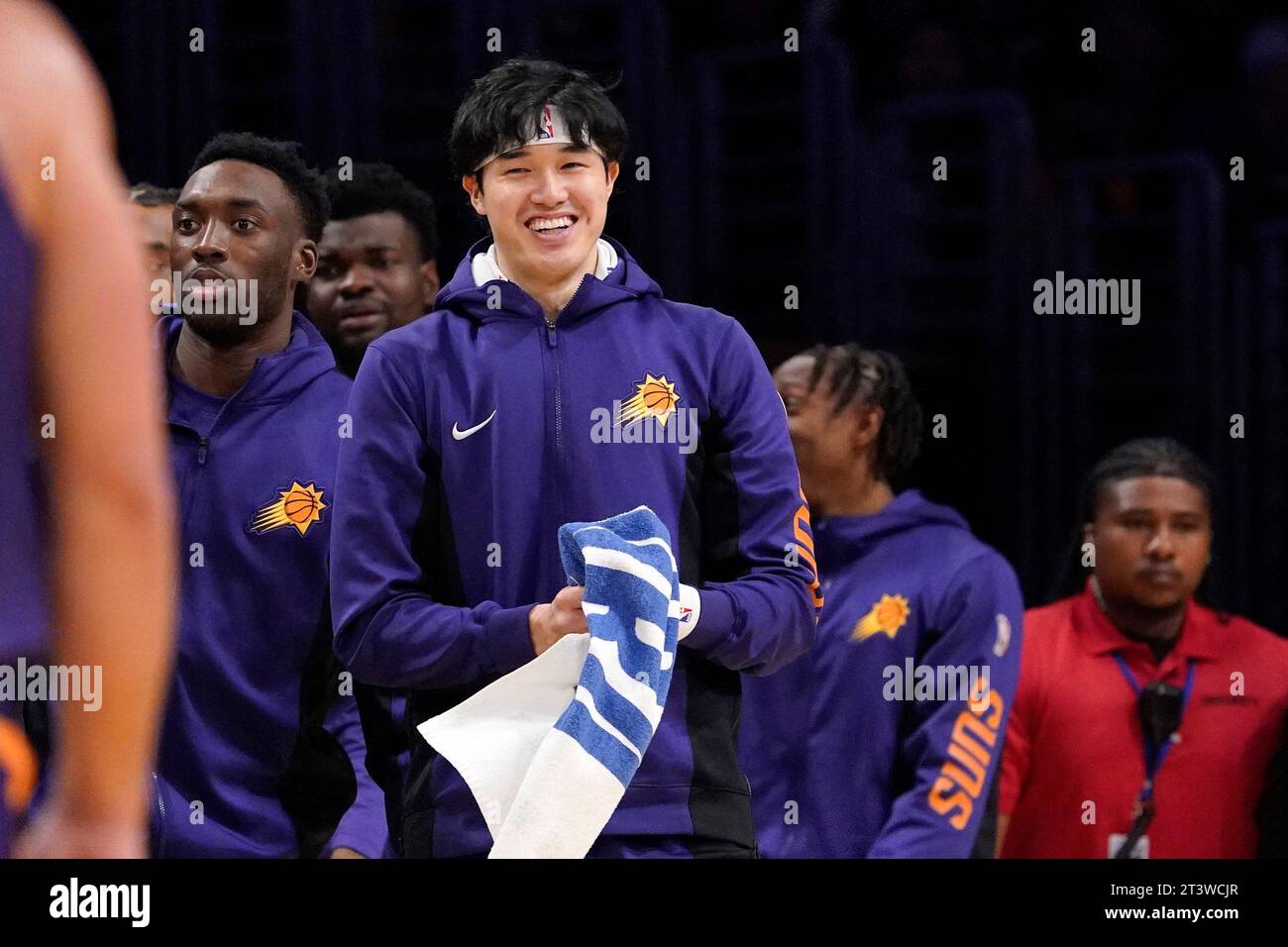 Phoenix Suns forward Yuta Watanabe watches from the bench during the ...