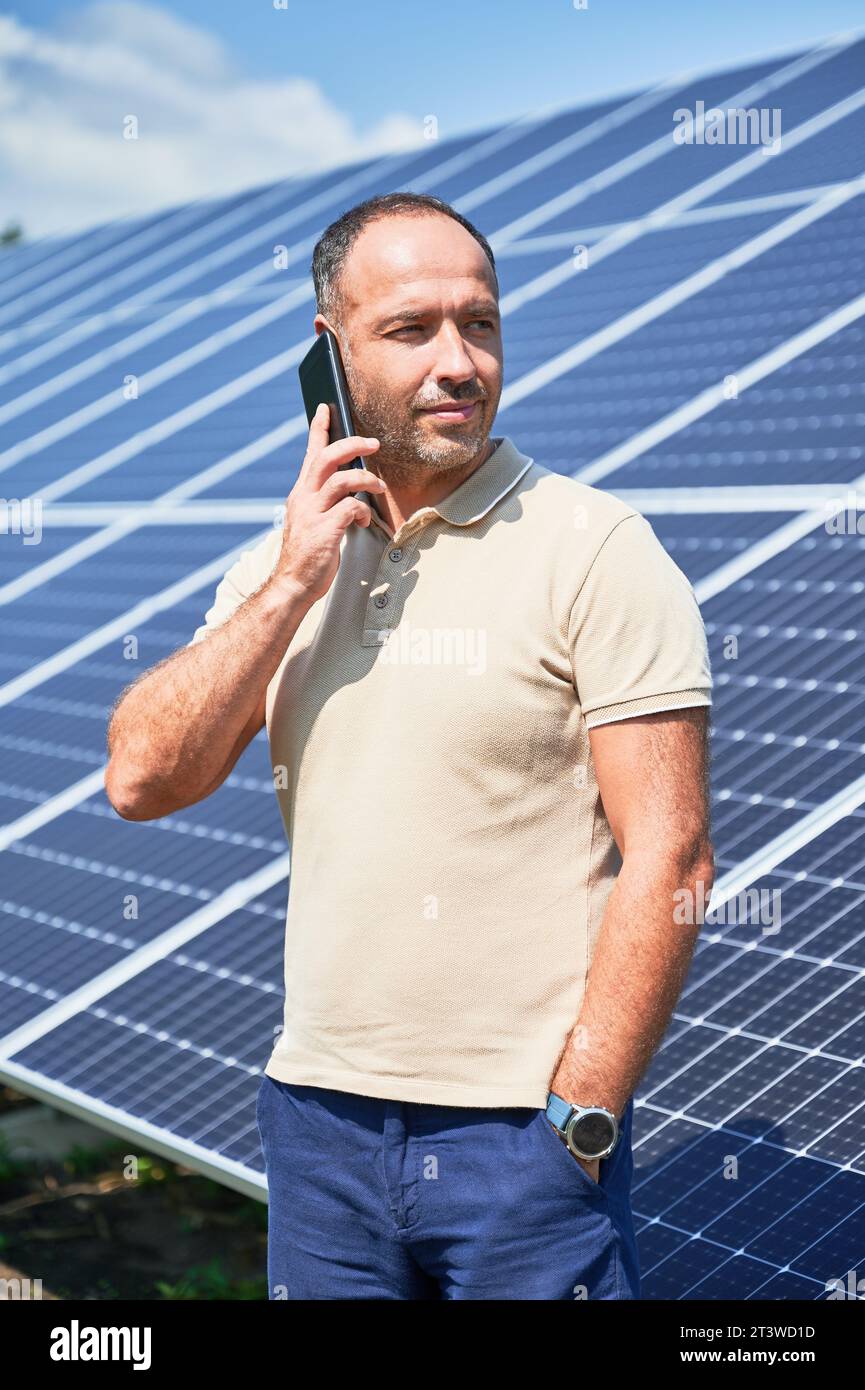 Confident businessman having important call. Man talking about his ...