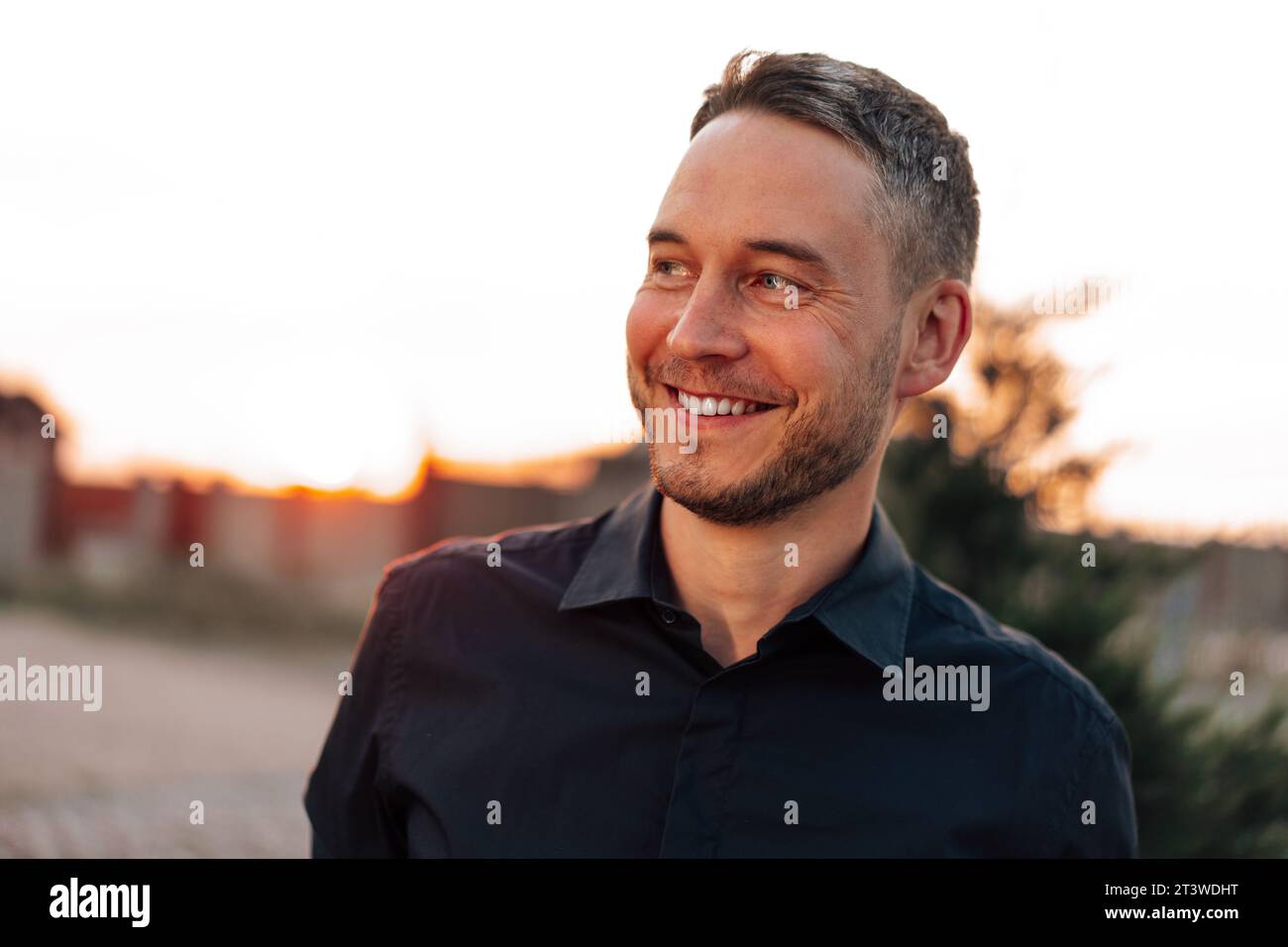 Portrait of handsome successful man standing outdoors Stock Photo - Alamy