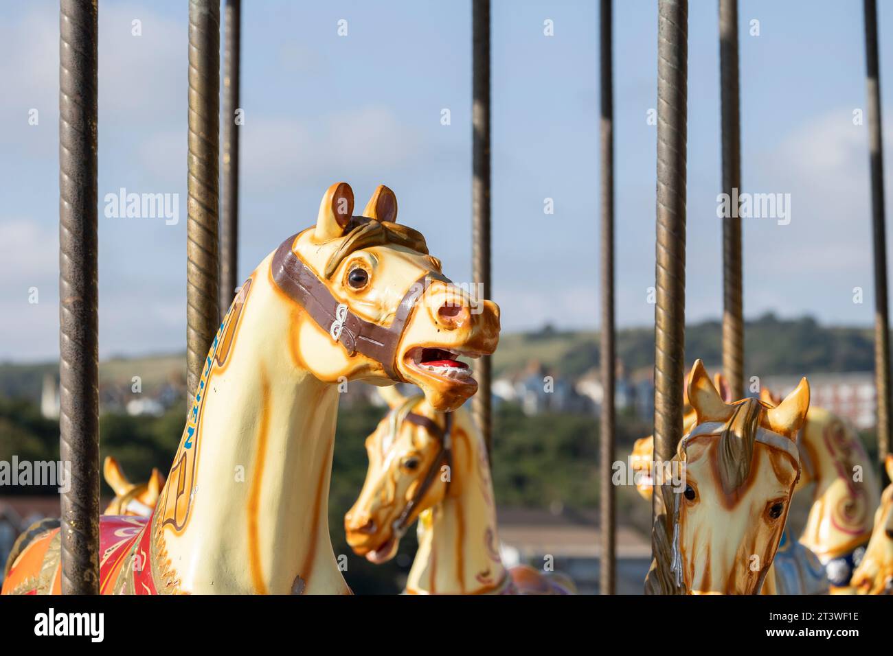 Riding around a horses carousel Stock Photo - Alamy