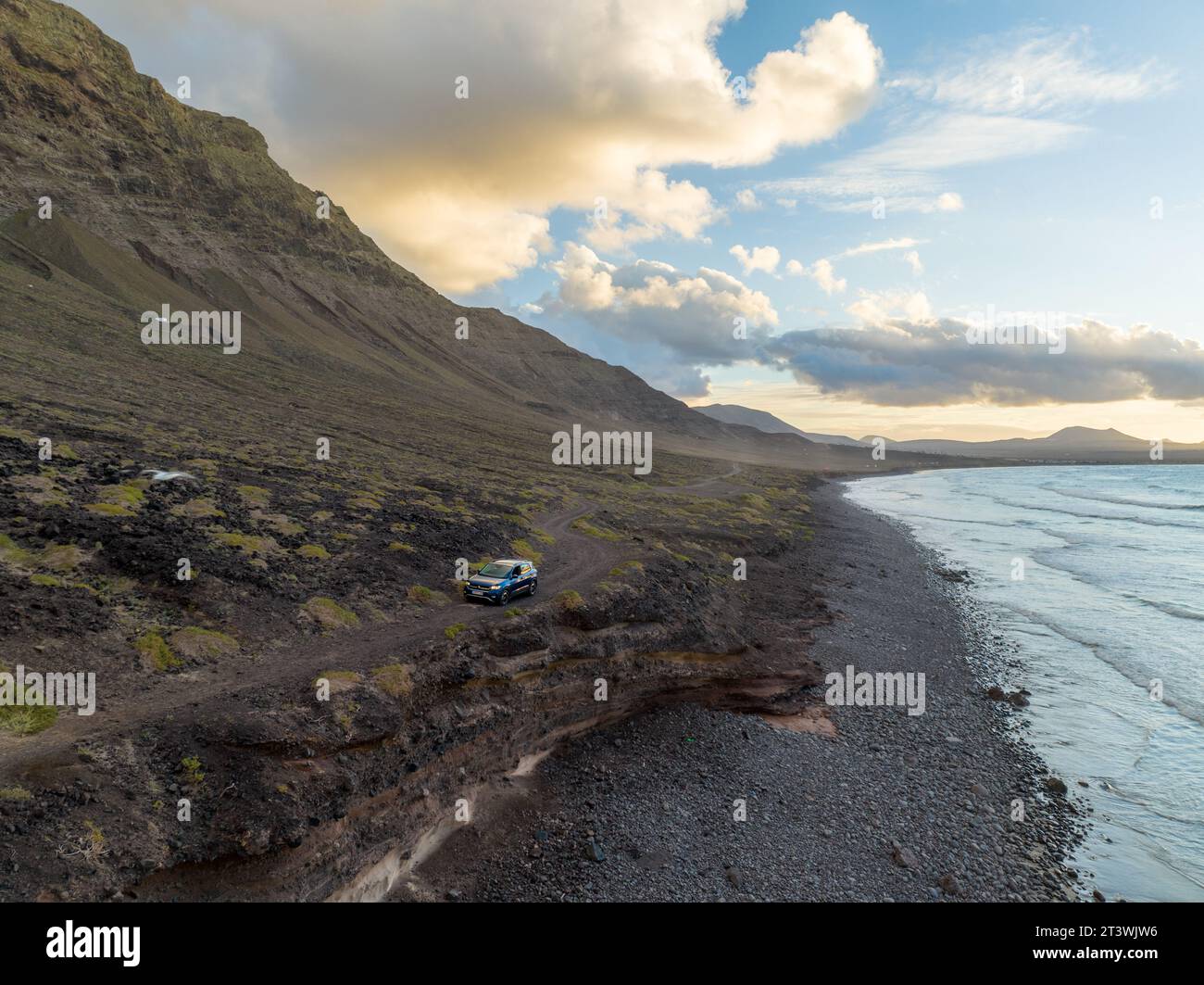 Car passing on gravel road hi-res stock photography and images - Alamy