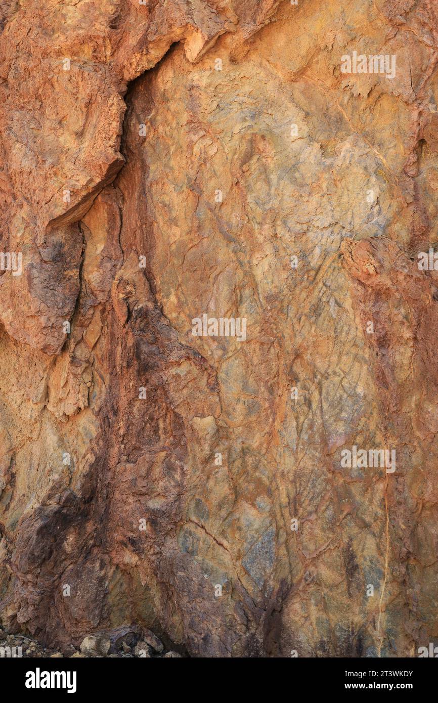 Colorful volcanic rock textures and minerals of a mountain in ...