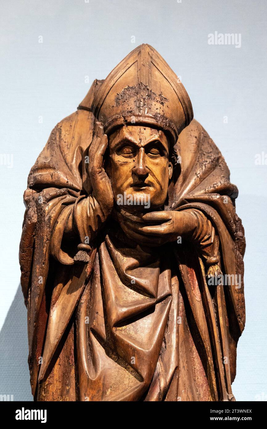 Walnut wood statue of Saint Denis of Paris holding his head, Brabant ... Walnut wood statue of Saint Denis of Paris holding his head, Brabant ...